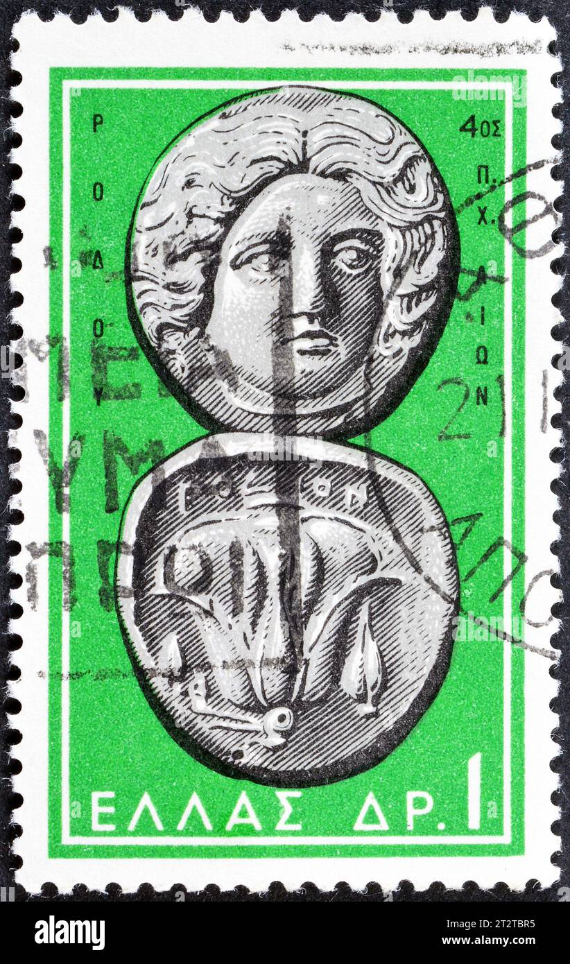 Cancelled postage stamp printed by Greece, that shows Helios (Sun) and ...