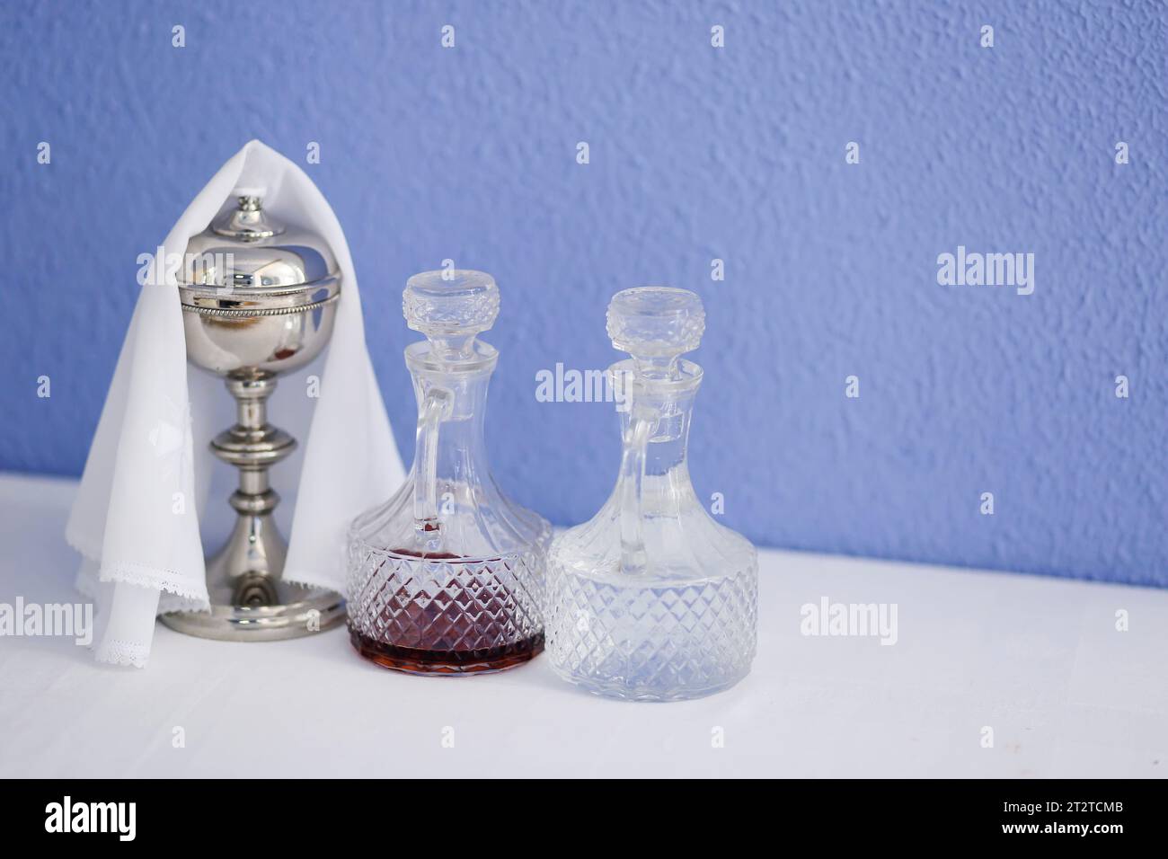 cruets with water and wine and chalice - religious objects Stock Photo ...