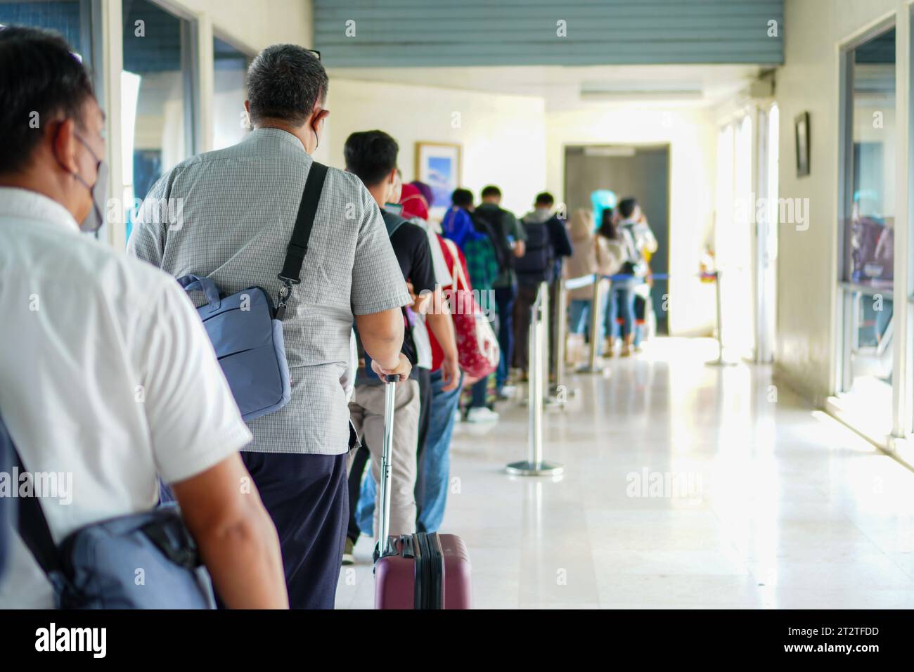 Crowded Gates: Passengers Waiting in Line for Their Flight Stock Photo ...