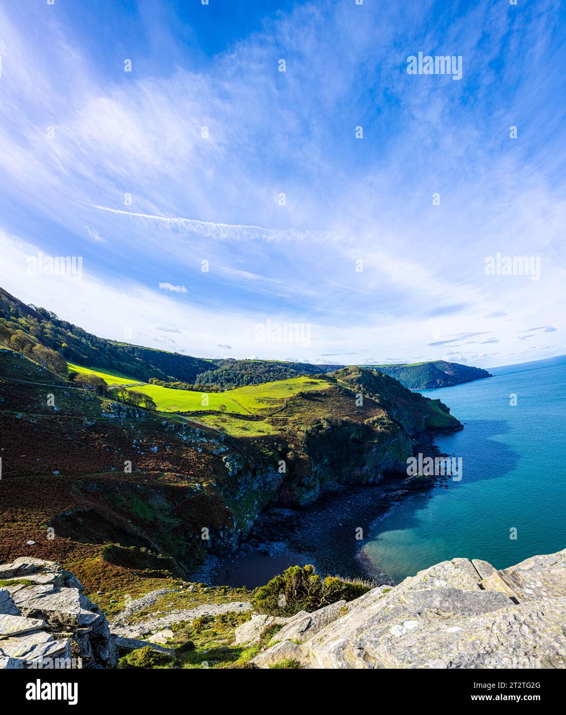 Photographer shooting the Valley of Rocks, a dry valley that runs ...