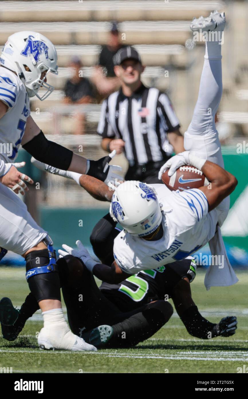 Memphis running back Blake Watson (4) is tackled by University Alabama ...