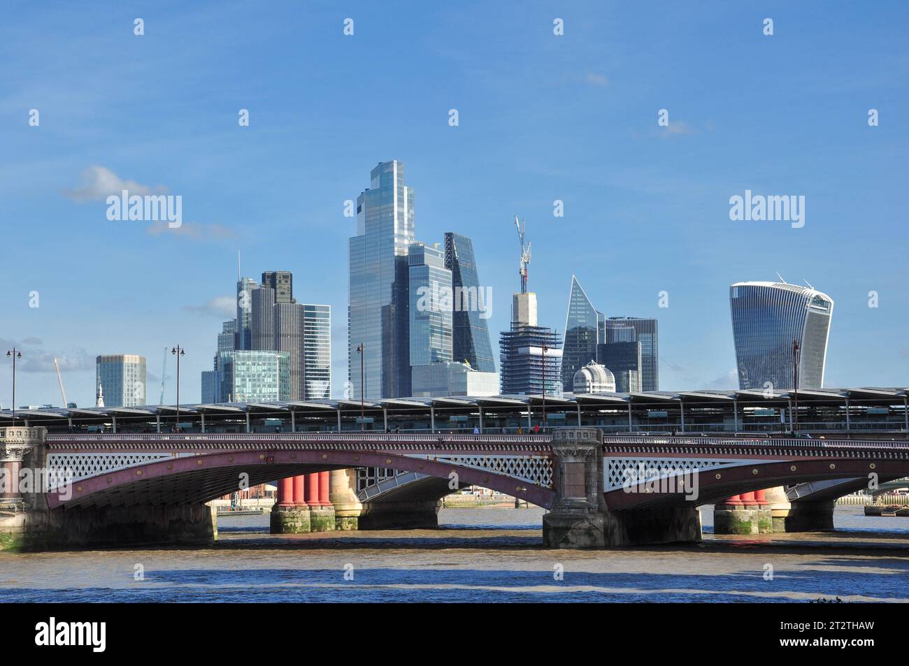 Blackfriars Bridge over the River Thames with city high-rise skyline ...
