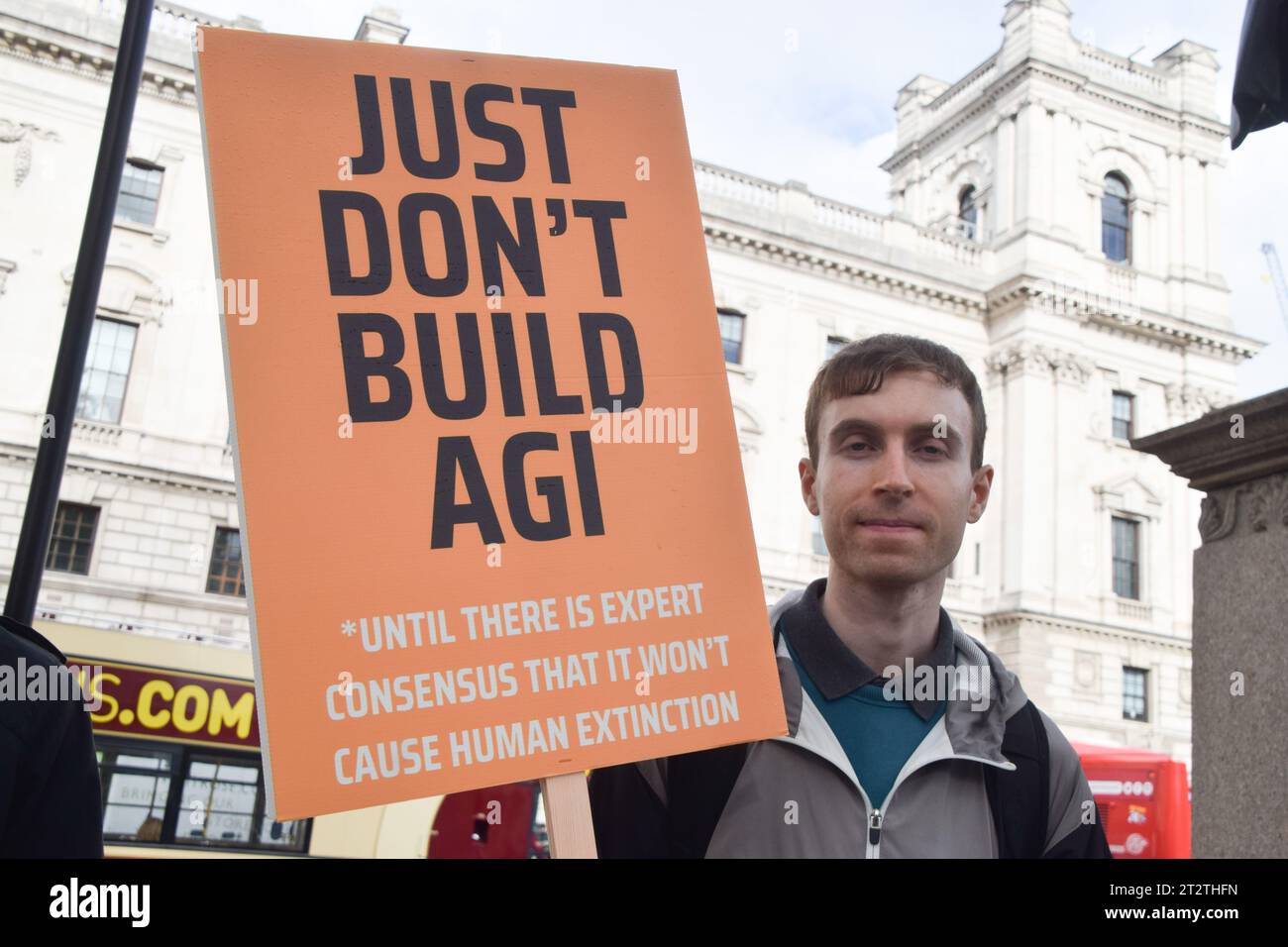 London, England, UK. 21st Oct, 2023. A protester holds a sign warning ...