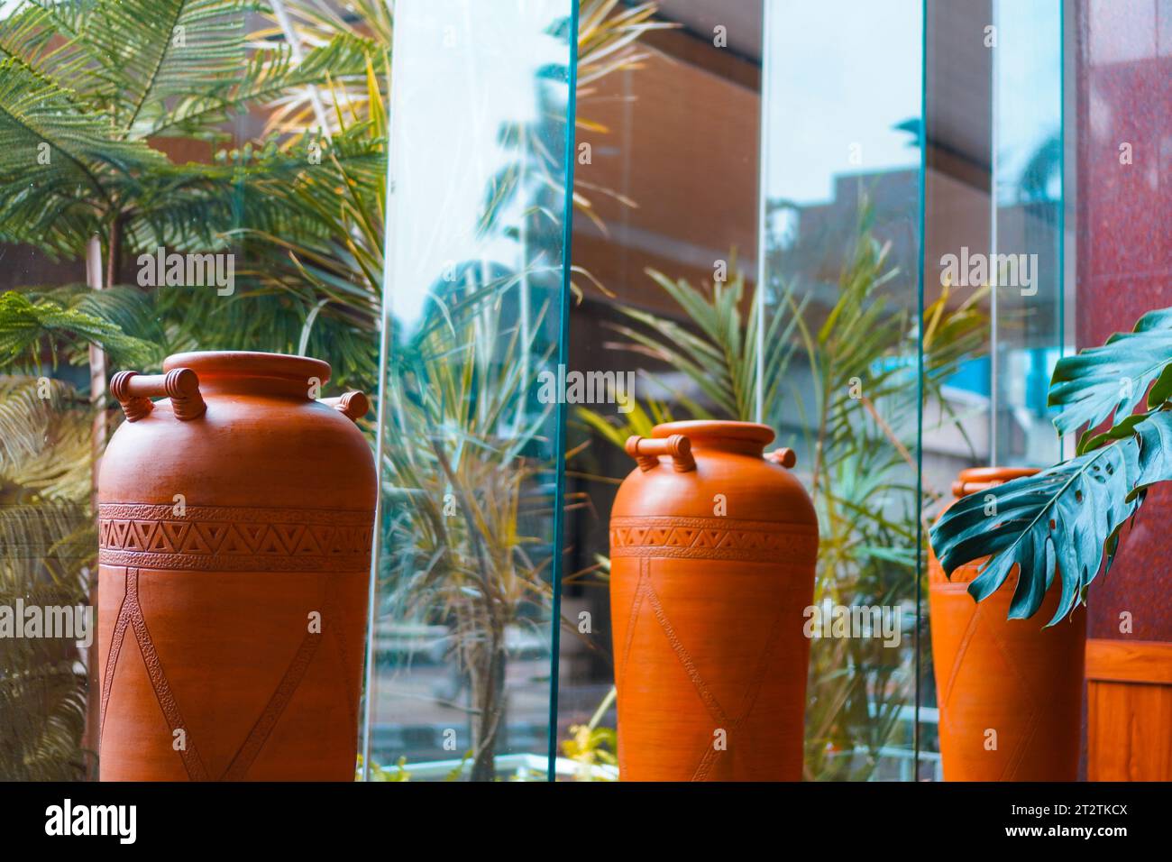 a collection of artistic brown jugs featuring exquisite carvings ...