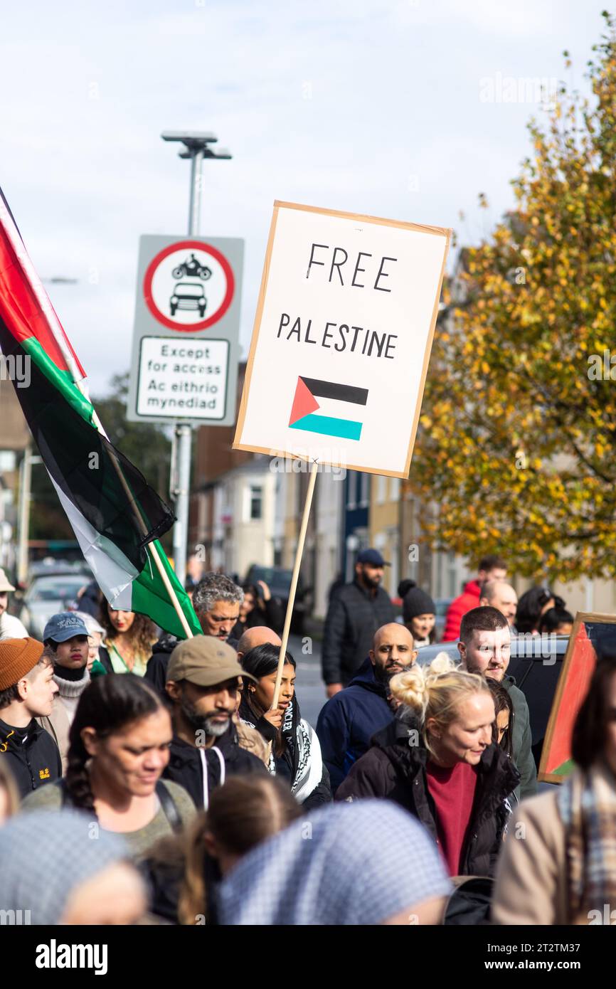 CARDIFF, WALES. 21st October 2023. Protesters march from Cardiff City ...