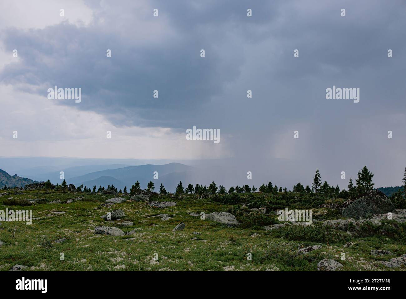 The heavy rain is coming. Change of weather in mountains, a ...