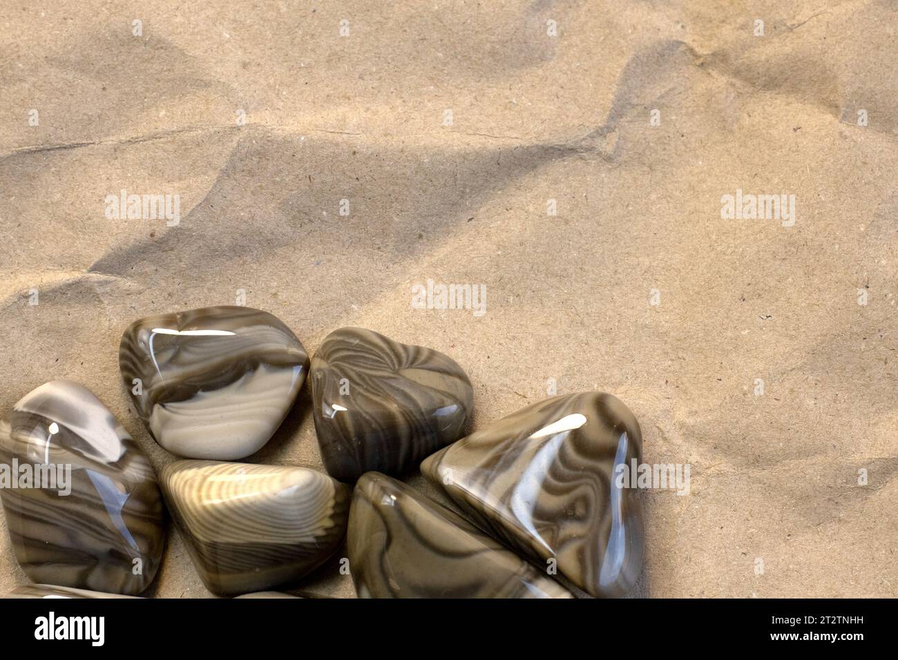 Macro mineral stone Flint on grey craft background close-up top view ...