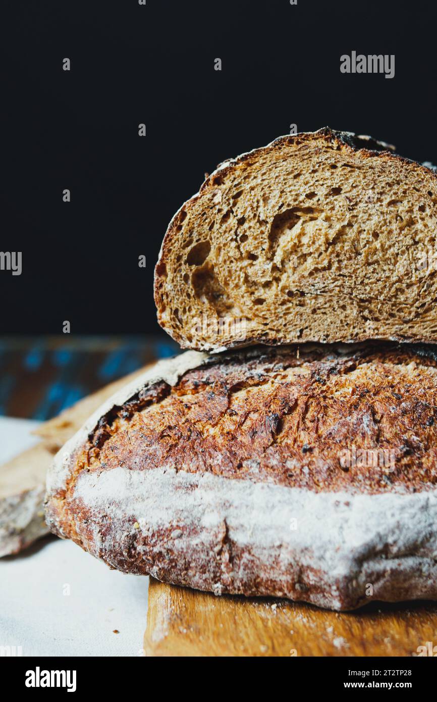Freshly baked bread with a golden crust close up. Yeast dough. Concept ...