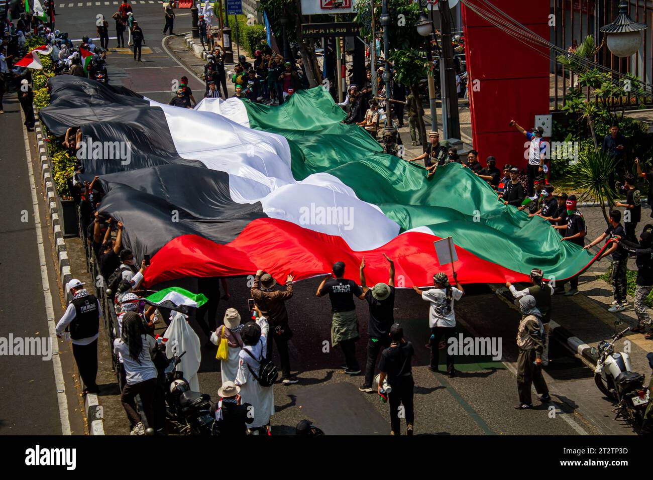 Bandung, West Java, Indonesia. 21st Oct, 2023. Protesters shout slogans ...