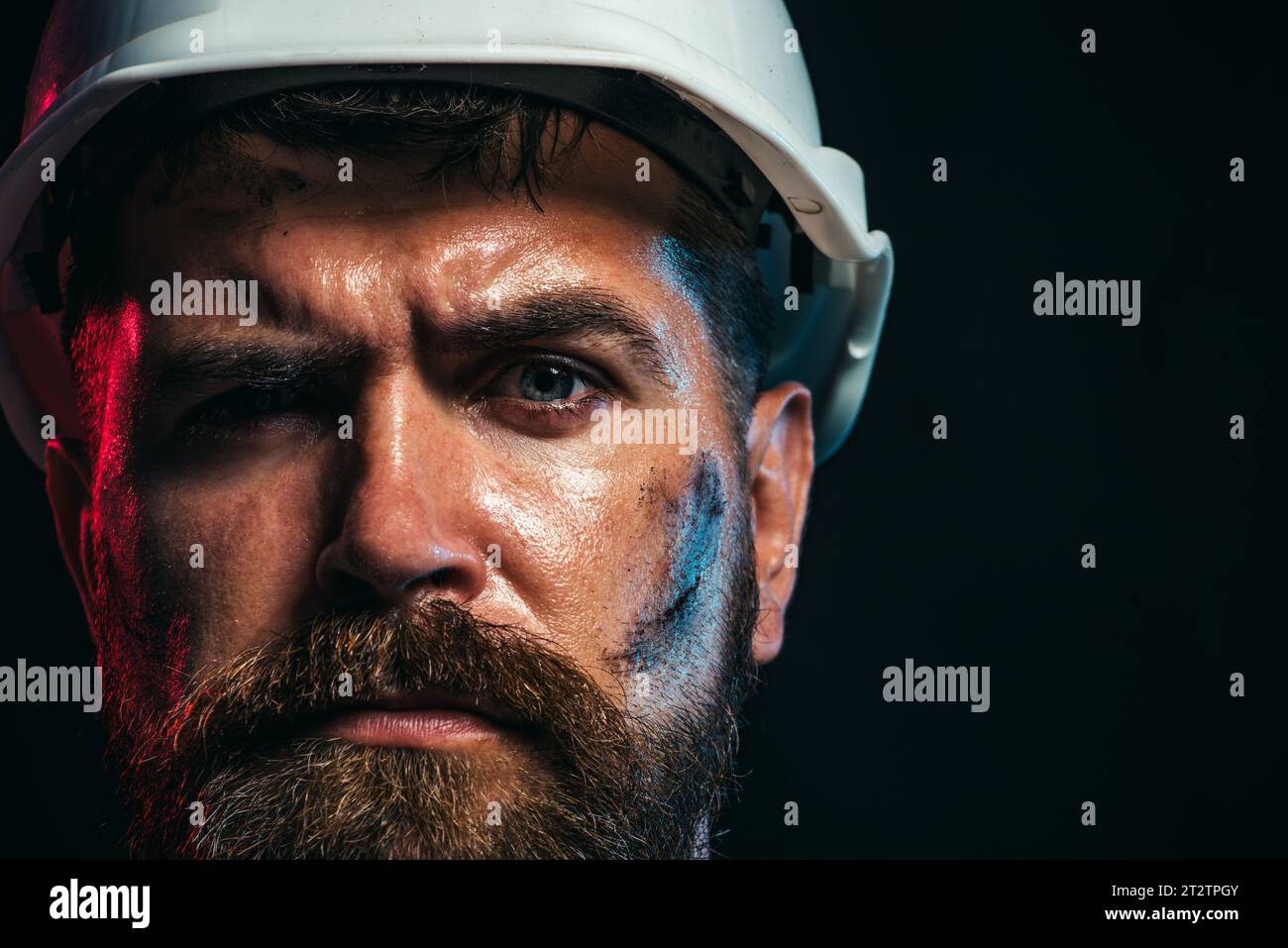 Closeup portrait male builder in hardhat. Industrial worker in safety ...