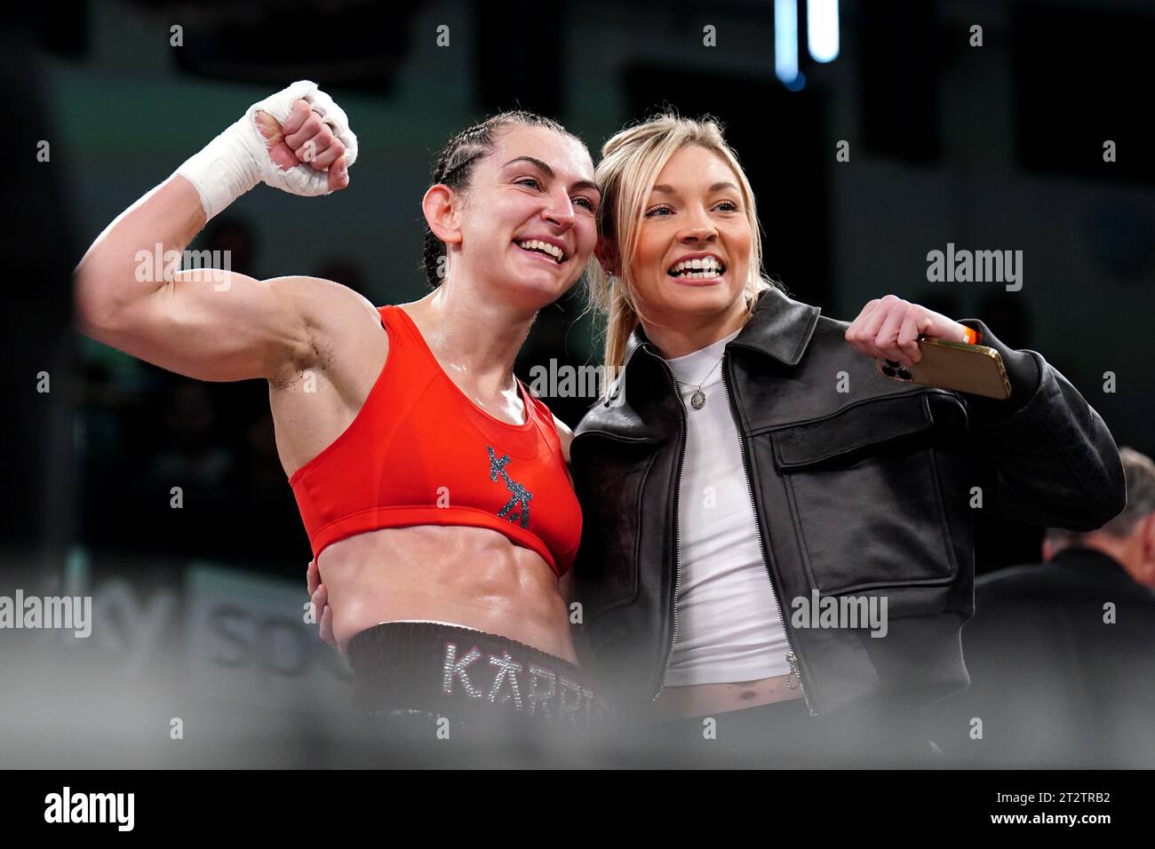 Karriss Artingstall celebrates with boxer Lauren Price (right) after ...