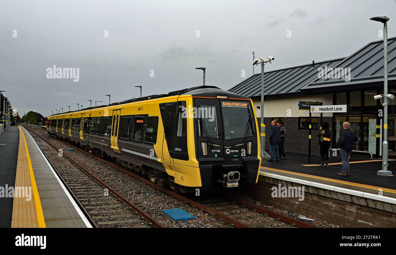 A train from Liverpool Central arrives at the newly opened railway ...