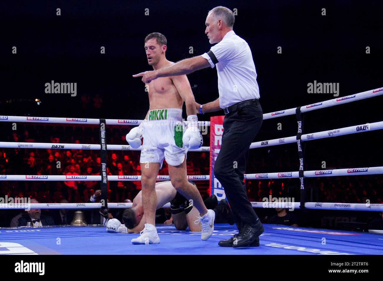 Paddy Lacey (left) knocks down Owen Kirk during the Middleweight bout ...