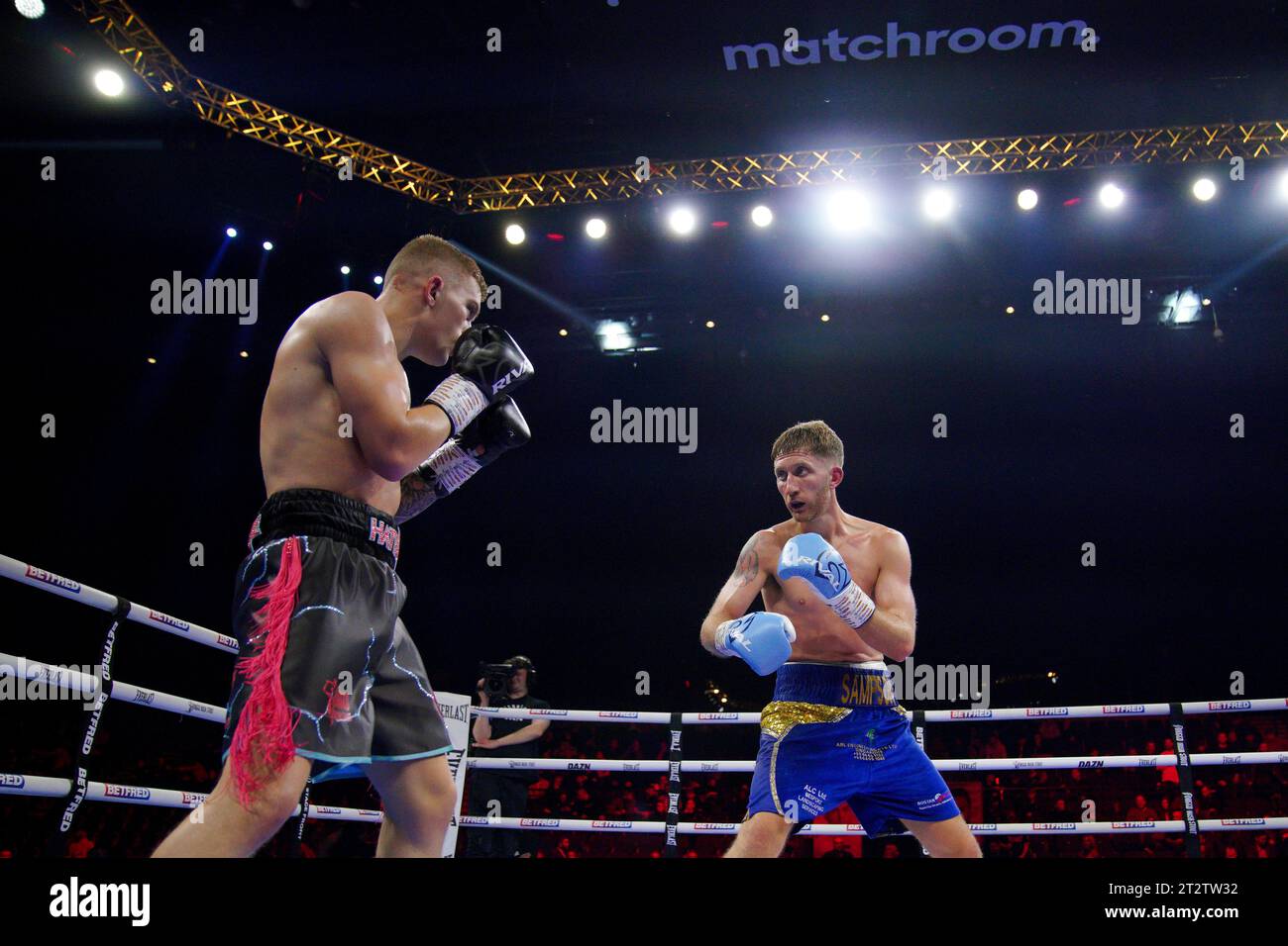 A general view of Campbell Hatton (left) and Jamie Sampson in action ...