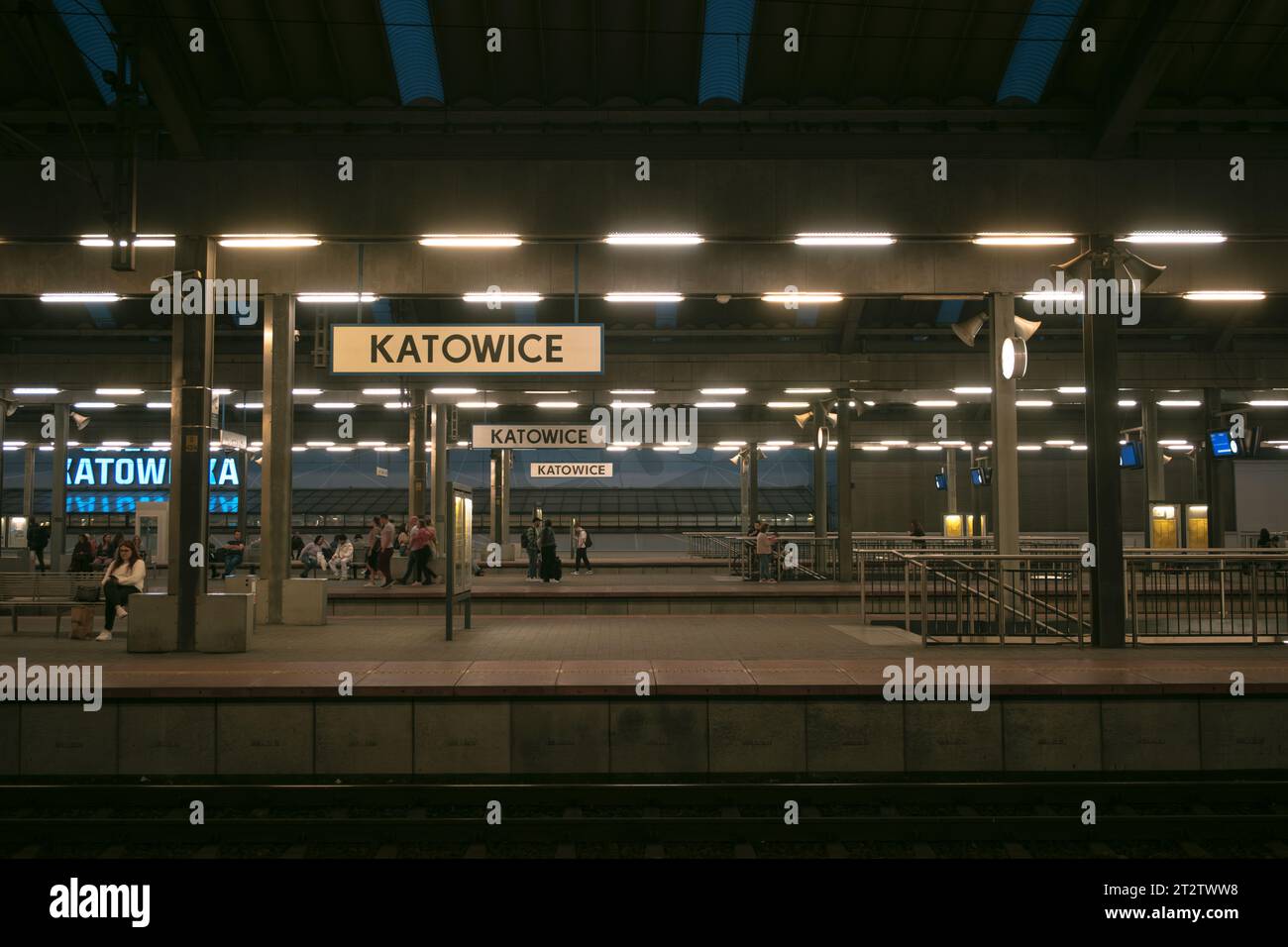 Platform of the train station at night in Katowice, Poland Stock Photo ...