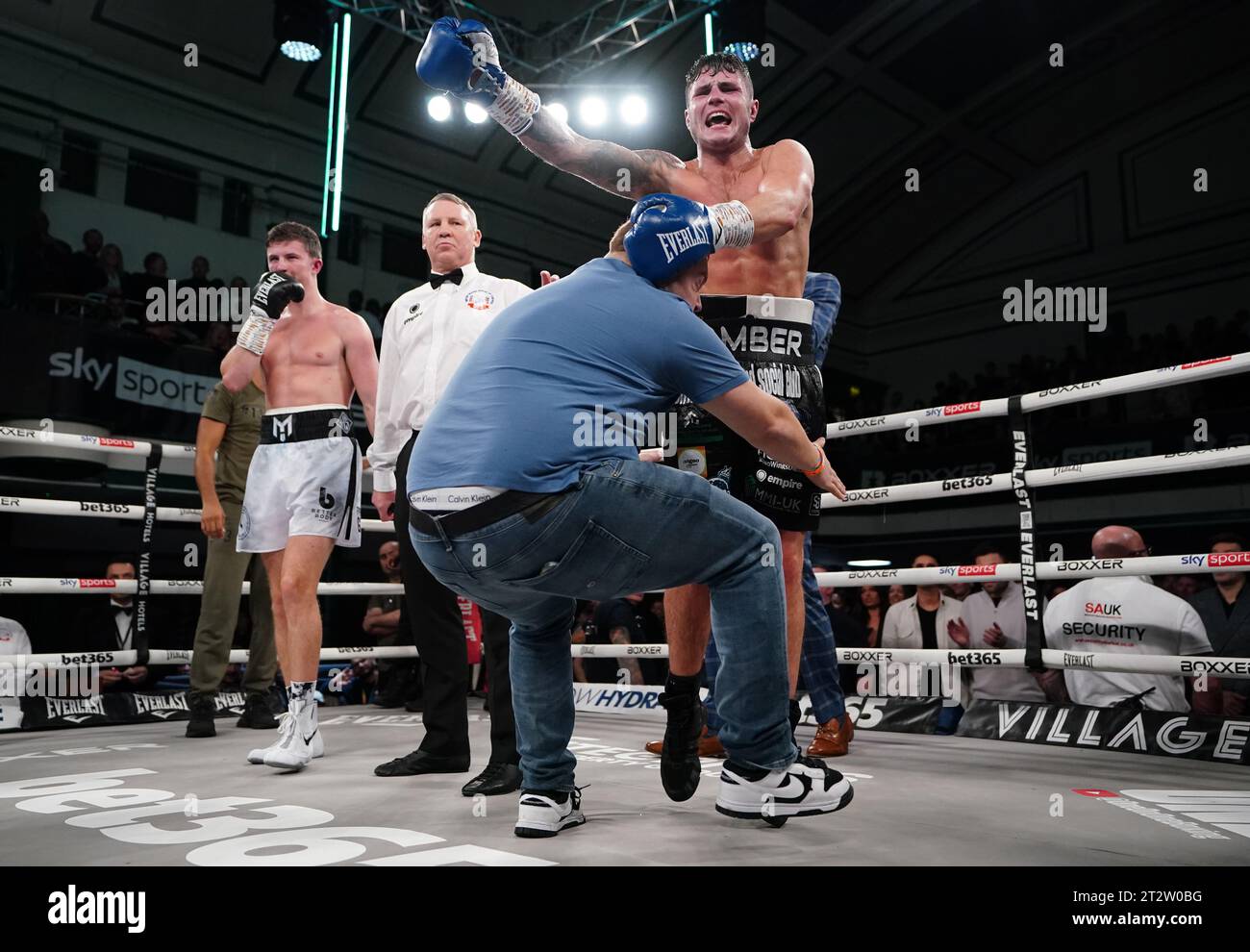 Joe Laws (right) celebrates victory over Michael Hennessy Jr at York ...