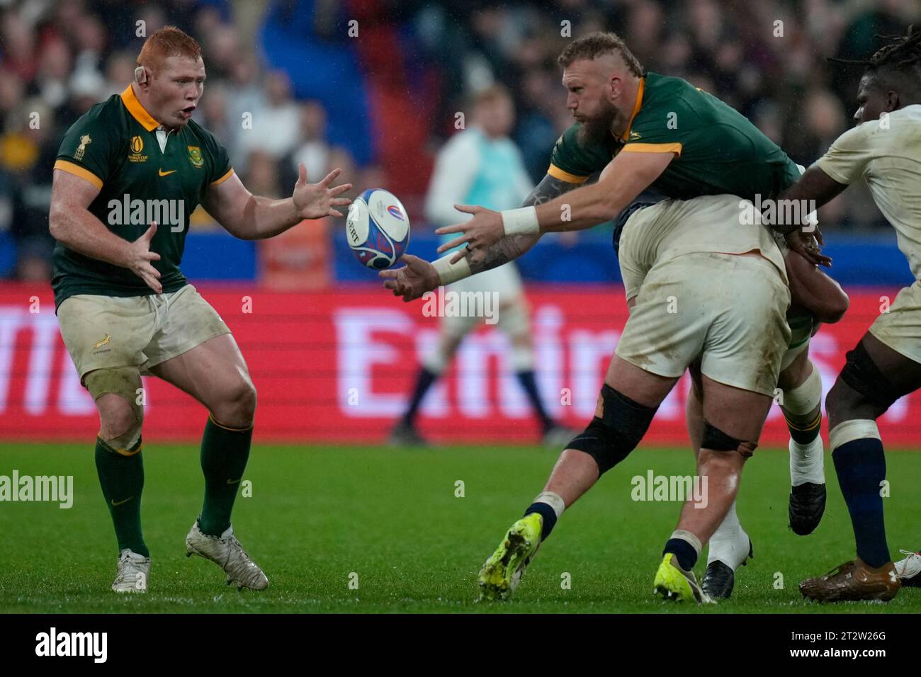 South Africa's Rg Snyman, right, passes the ball to South Africa's ...