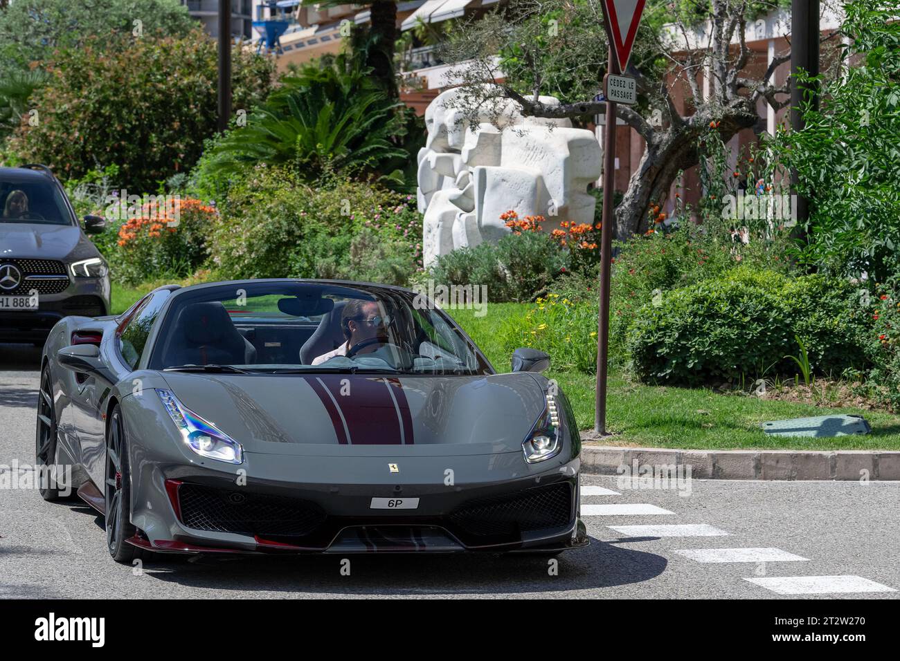 Grey Ferrari 488 Pista Spider driving on the road Stock Photo - Alamy