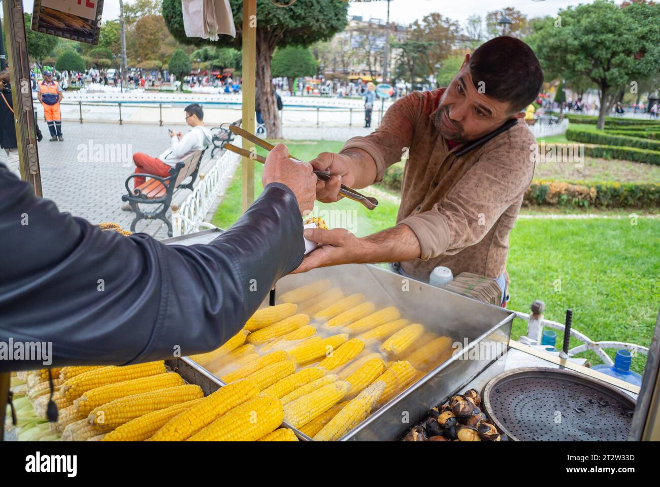 Istanbul, Turkey, Peole buying a corn at a stand, Editorial only Stock ...