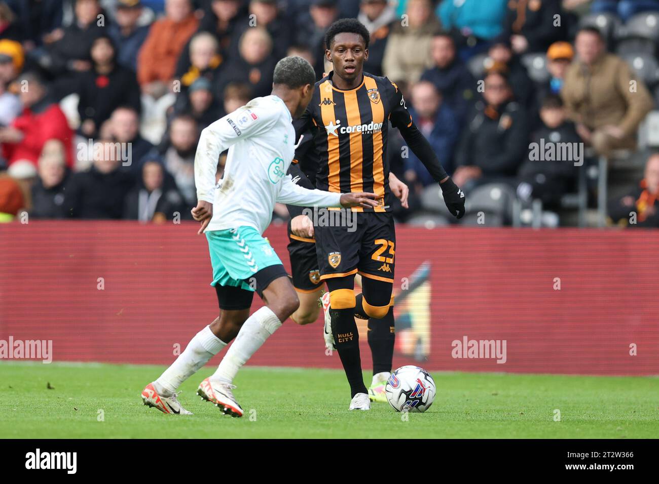 Jaden Philogene of Hull City looks to get past Kyle Walker-Peters of ...