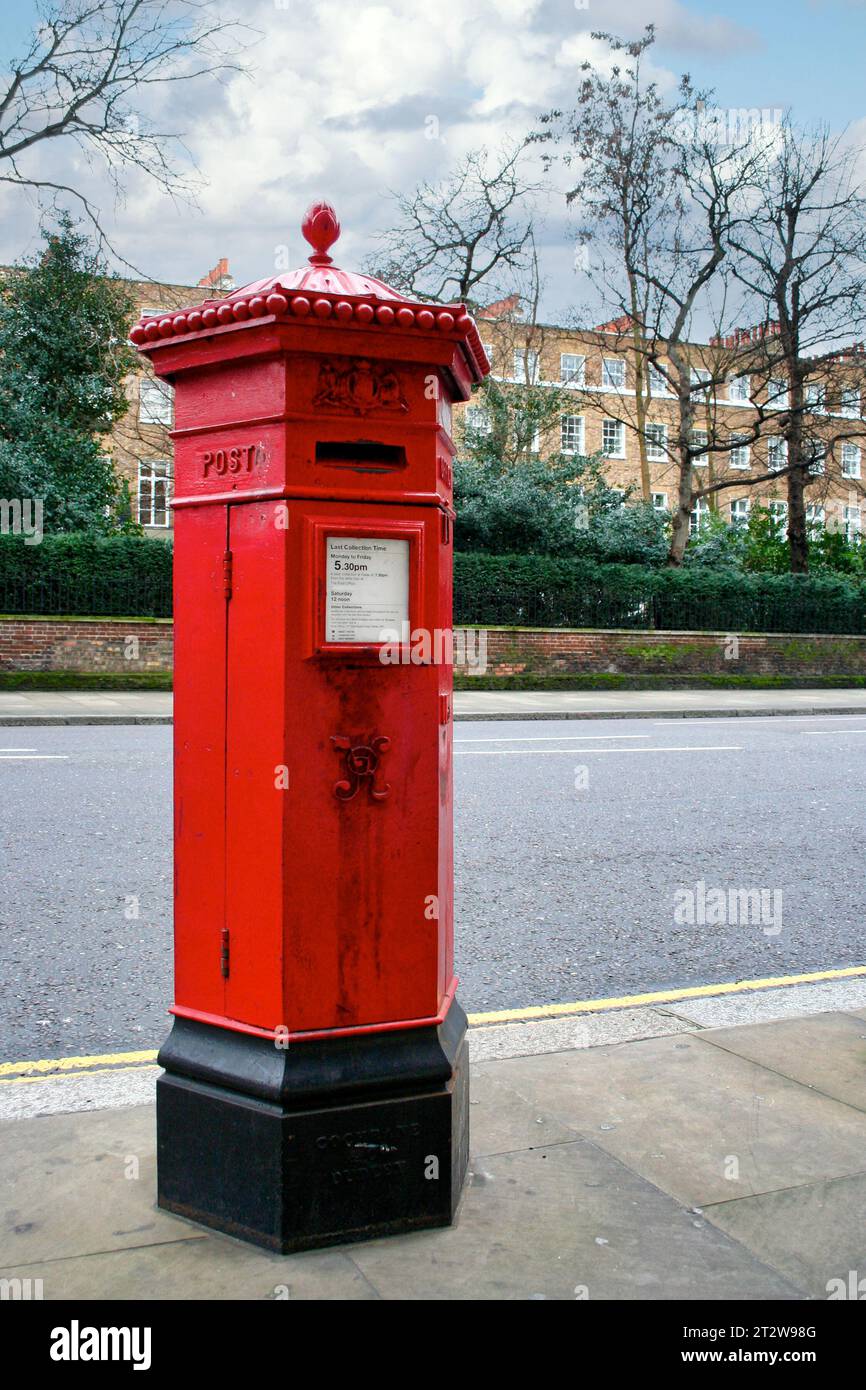 A Victorian hexagonal red post box of the Penfold type manufactured in ...