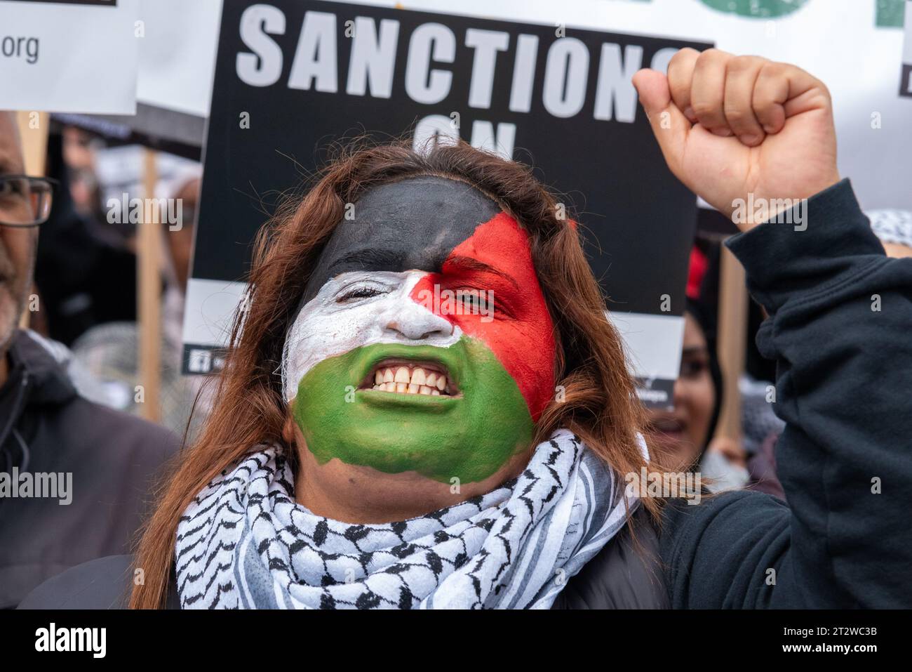 Female with Palestinian flag face paint at a Free Palestine protest in ...