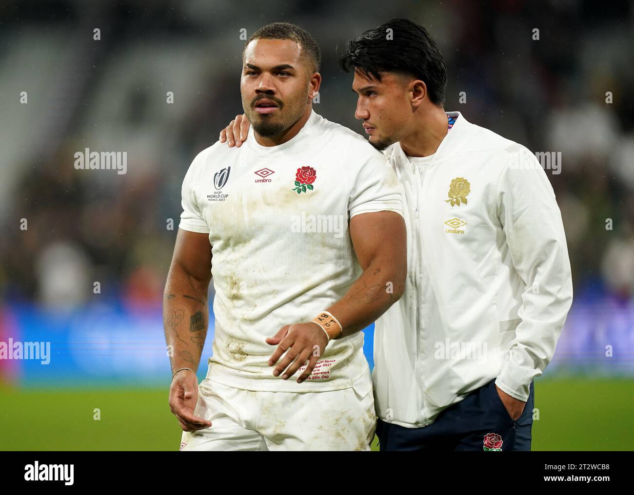 England's Ollie Lawrence (left) and England's Marcus Smith look ...