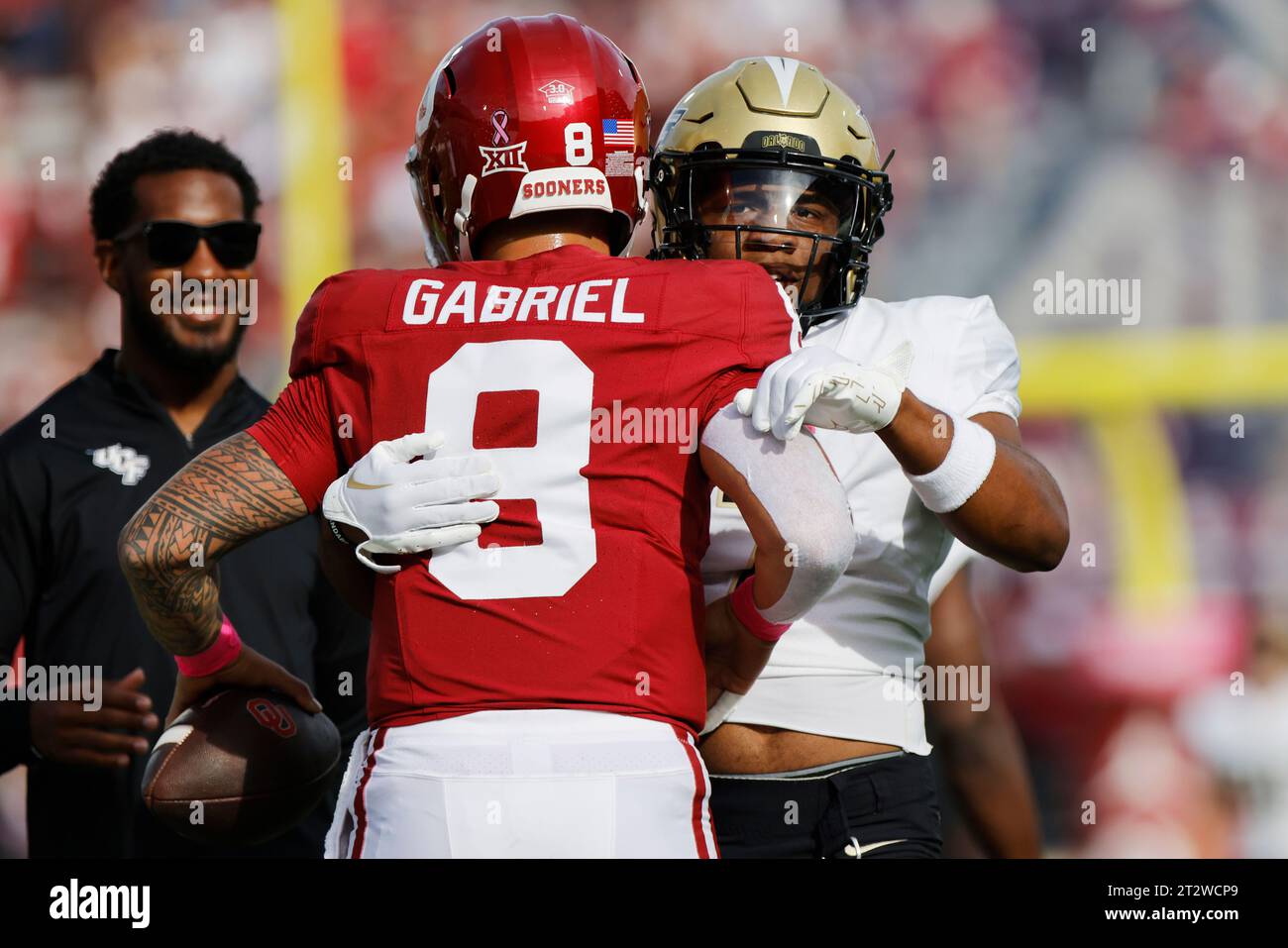 Central Florida running back RJ Harvey, right, hugs Oklahoma ...