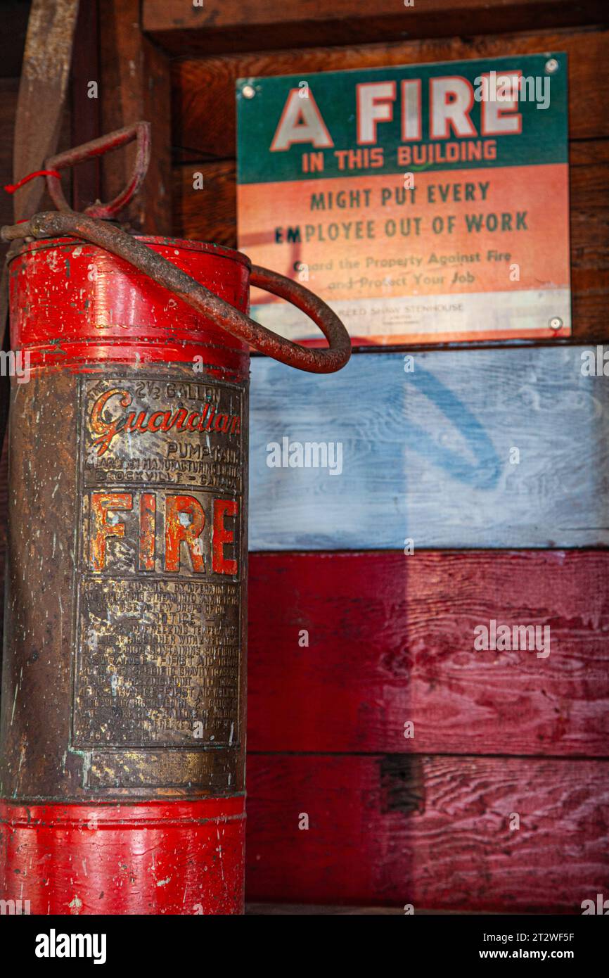 Antique fire extinguisher with a pump handle in the Britannia Ship Yard ...