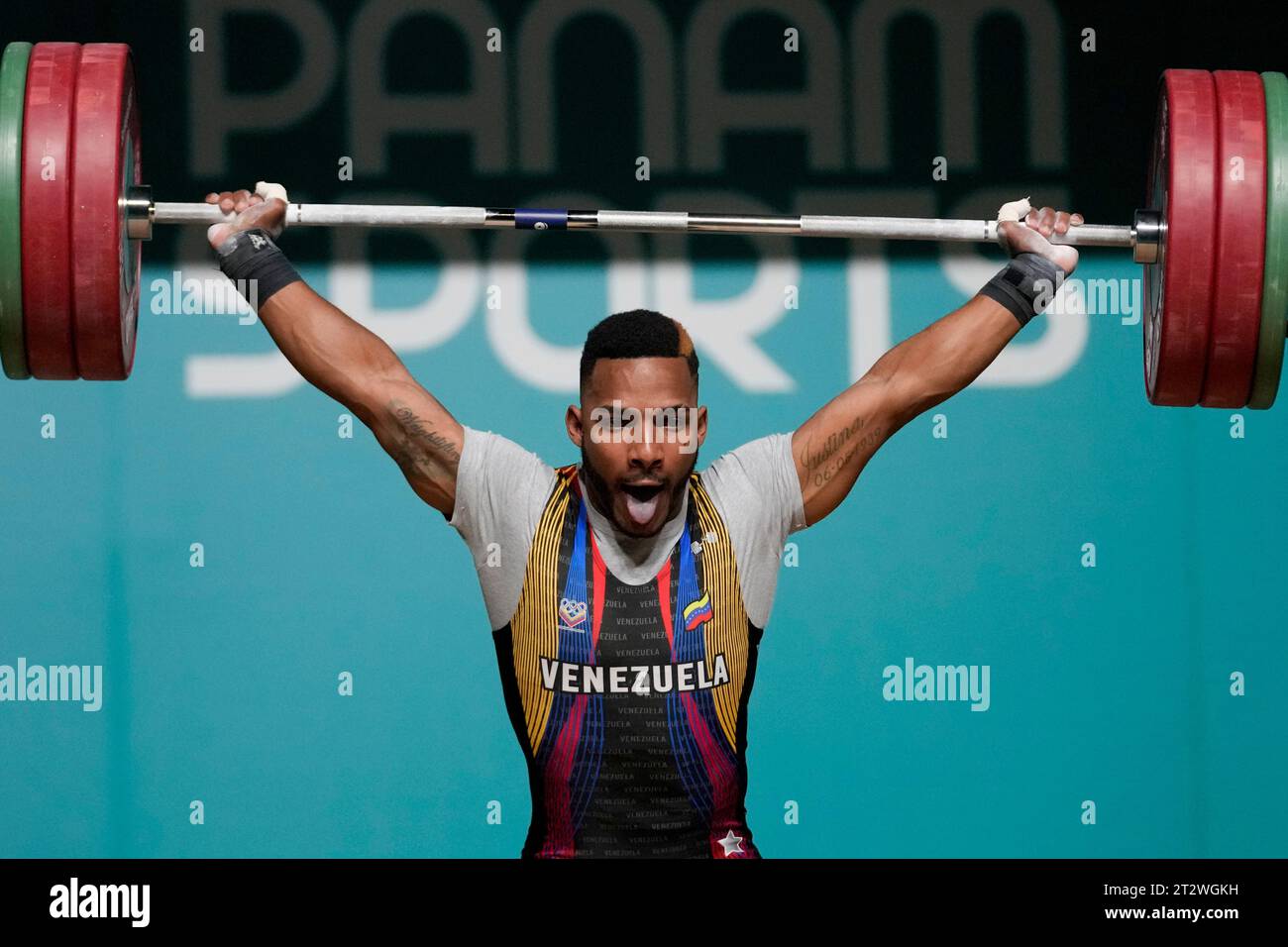 Venezuela's Julio Mayora competes in the men's weightlifting 73Kg at ...