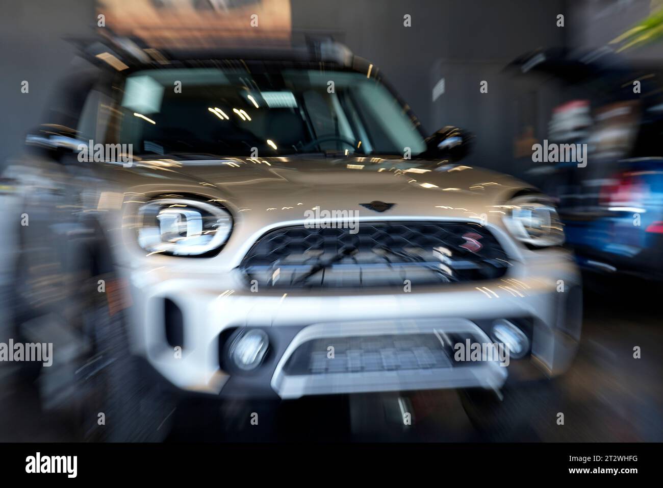 With a combination of a slow shutter speed and the racking of a zoom ...