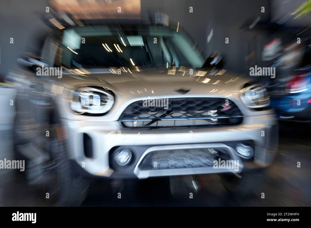 A combination of a slow shutter speed and the racking of a zoom lens ...