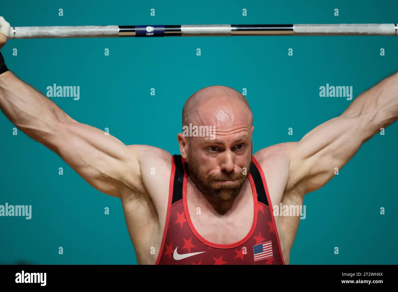 Travis Cooper of United States competes in the men's weightlifting 73Kg ...