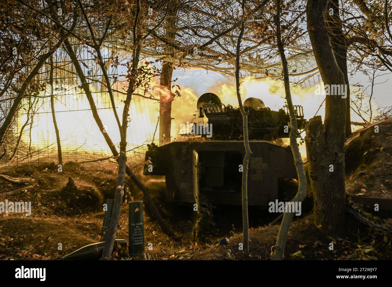 Ukraine. 21st Oct, 2023. Ukrainian servicemembers fire a 2S1 "Gvozdika ...