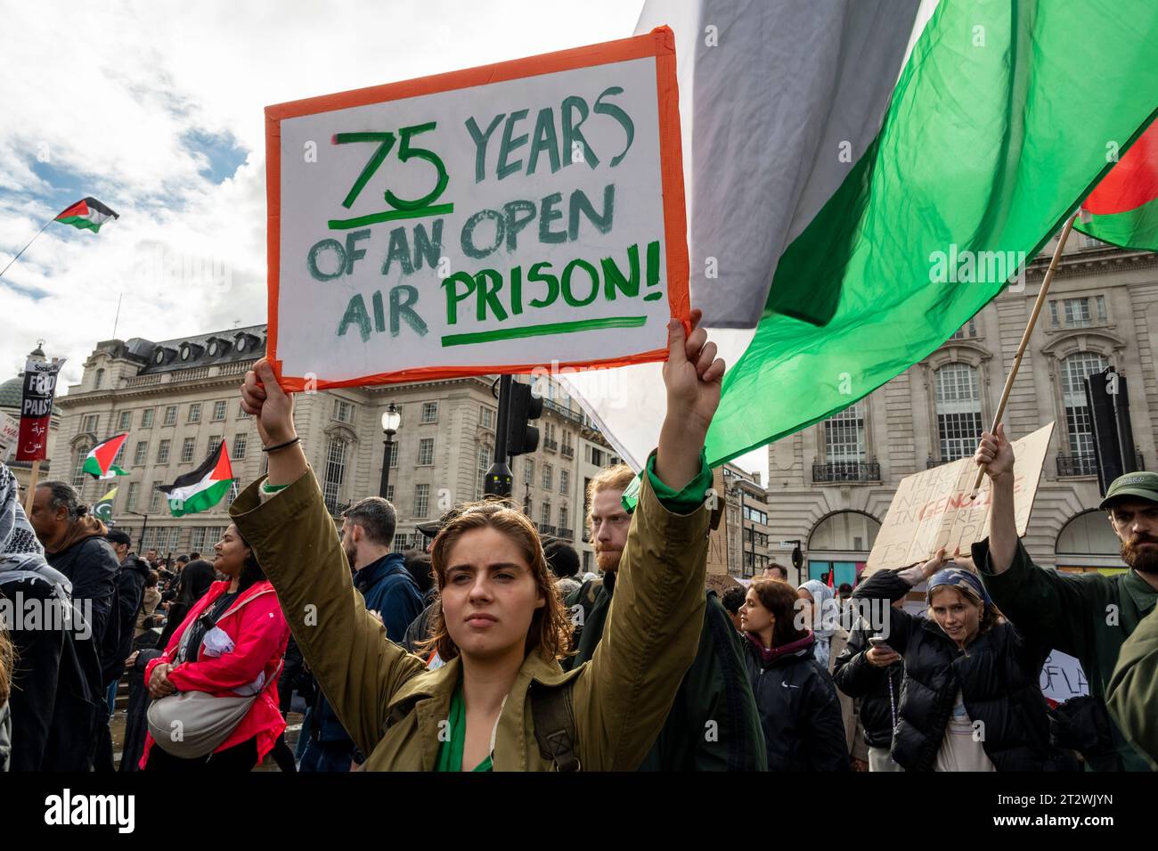 Demonstration against the Israel Gaza War. A young woman holds a ...