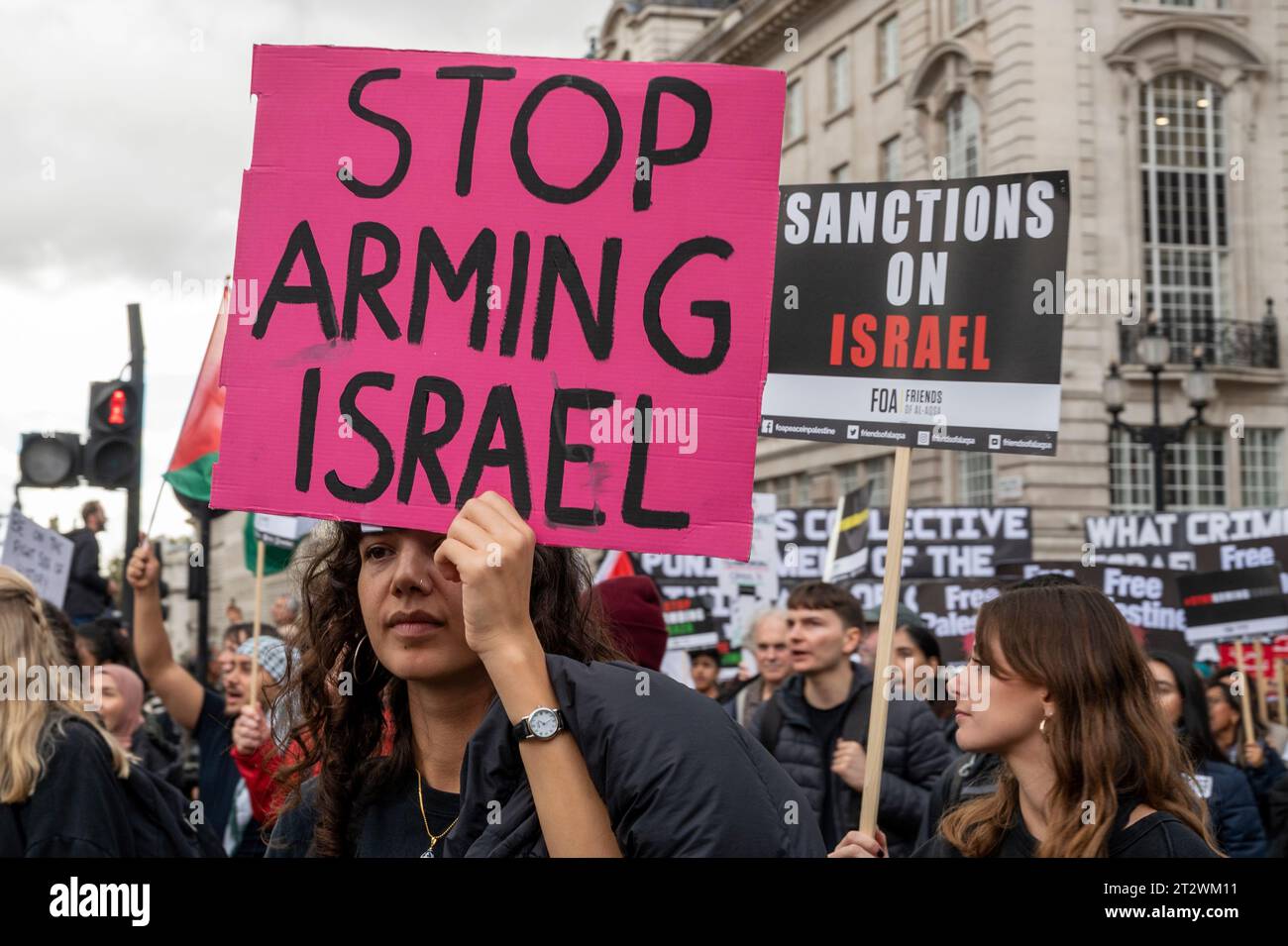 Protestors against the bombing of Gaza with placards "Stop arming ...