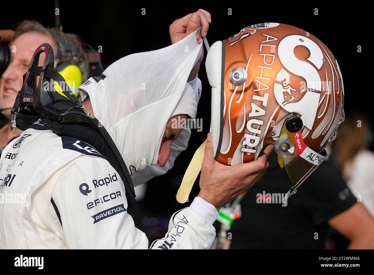 AlphaTauri driver Daniel Ricciardo, of Australia, take off his ...