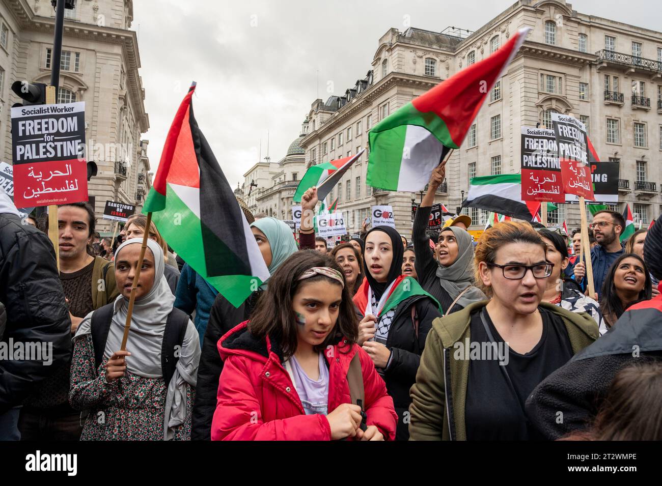 Protestors against the bombing of Gaza with Palestinian flags and ...