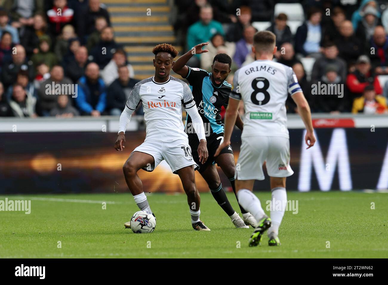 Swansea, UK. 21st Oct, 2023. Jamal Lowe of Swansea City (l) in action ...