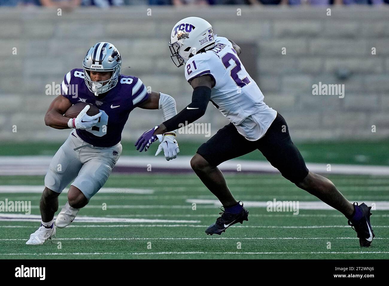 Kansas State wide receiver Phillip Brooks (8) is tackled by TCU safety ...