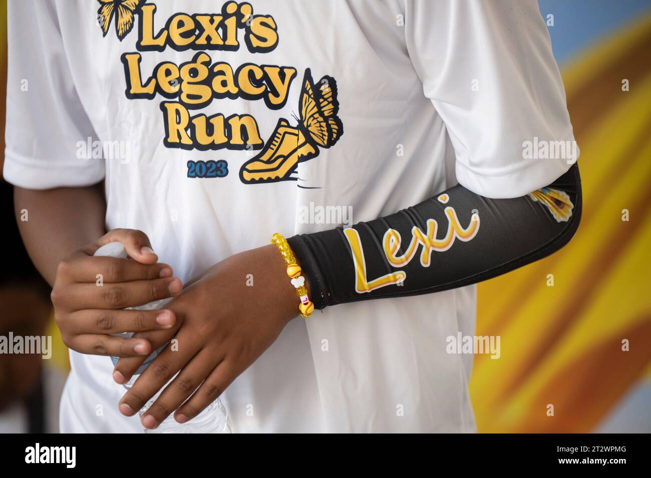 Twelve-year-old Noah Montalvo wears a sleeve depicting the name, "Lexi ...