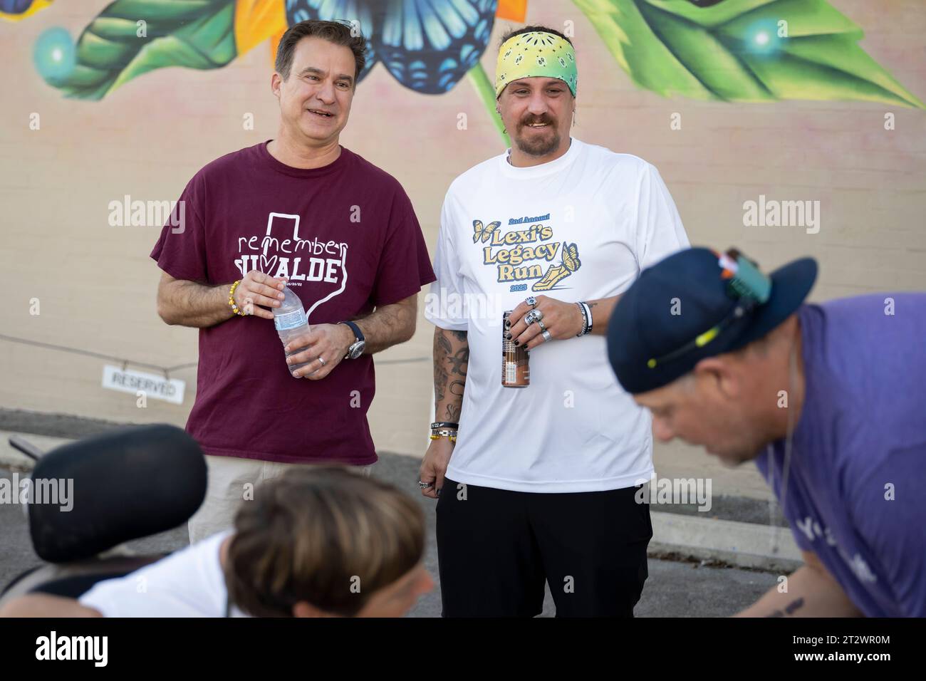Democratic Texas state Sen. Roland Gutierrez, left, speaks with Brett ...