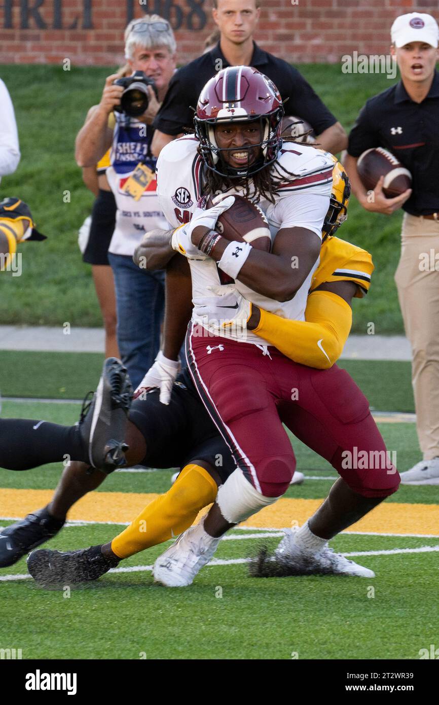 South Carolina tight end Trey Knox, top, is tackled by Missouri defensive back Jaylon Carlies ...