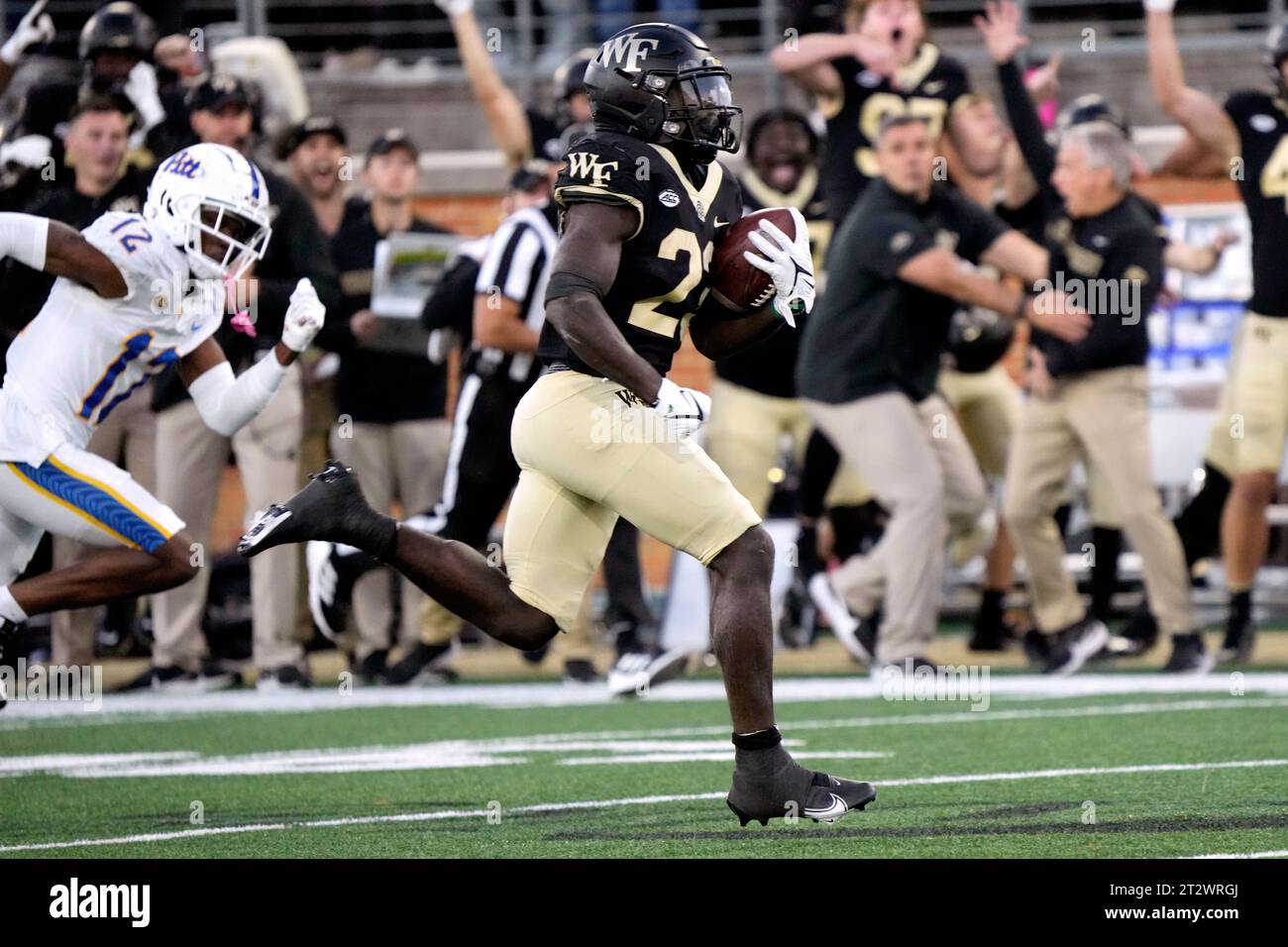 Wake Forest running back Demond Claiborne (23) runs for a touchdown ...