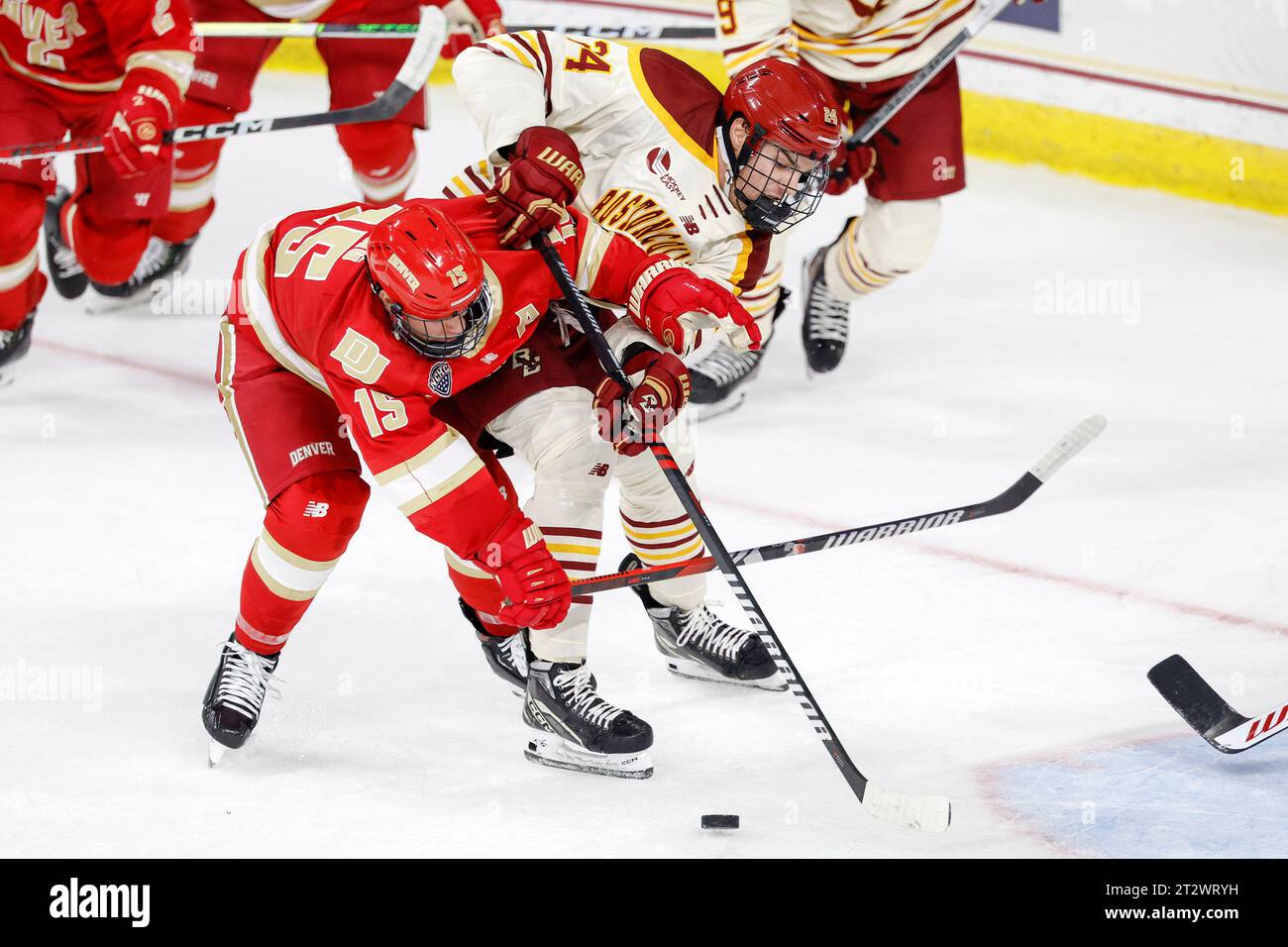 Denver forward Carter King (15) battles with Boston College forward ...