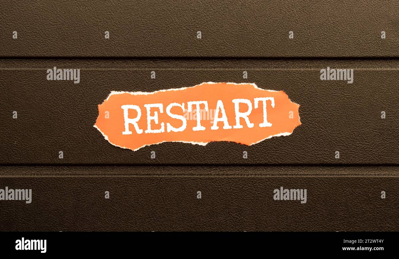 Restart and start symbol. The concept word Restart on wooden circles ...