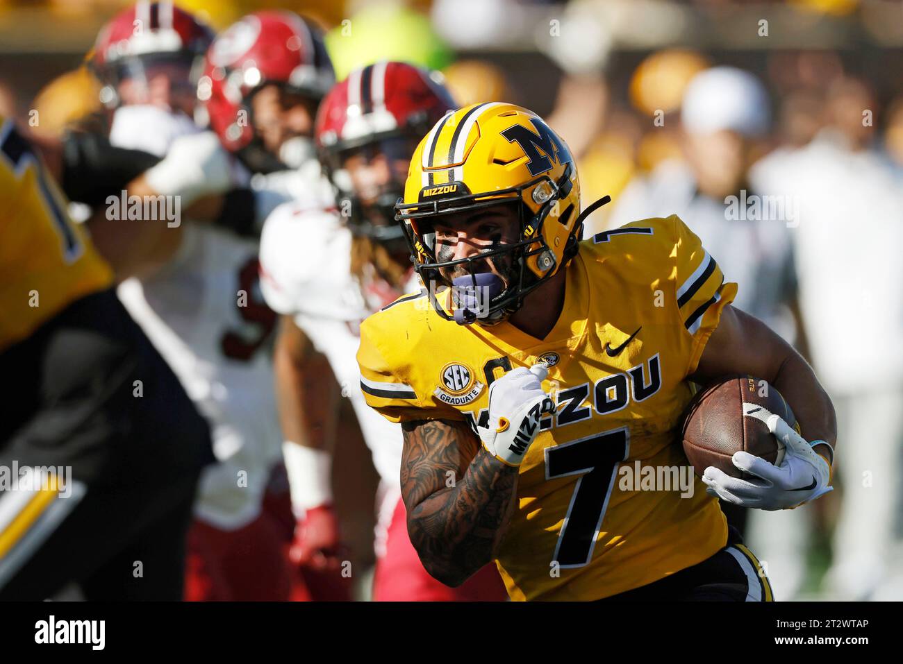 Missouri running back Cody Schrader (7) gets past South Carolina ...