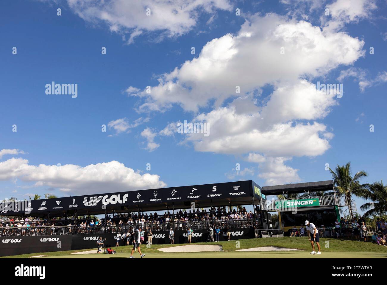 Captain Dustin Johnson of 4Aces GC putts on the 16th green during the ...