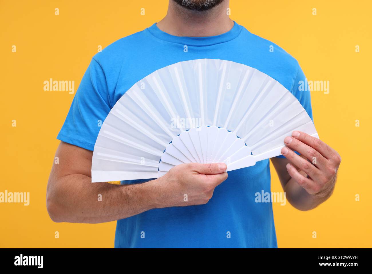 Hot day orange fan hi-res stock photography and images - Alamy