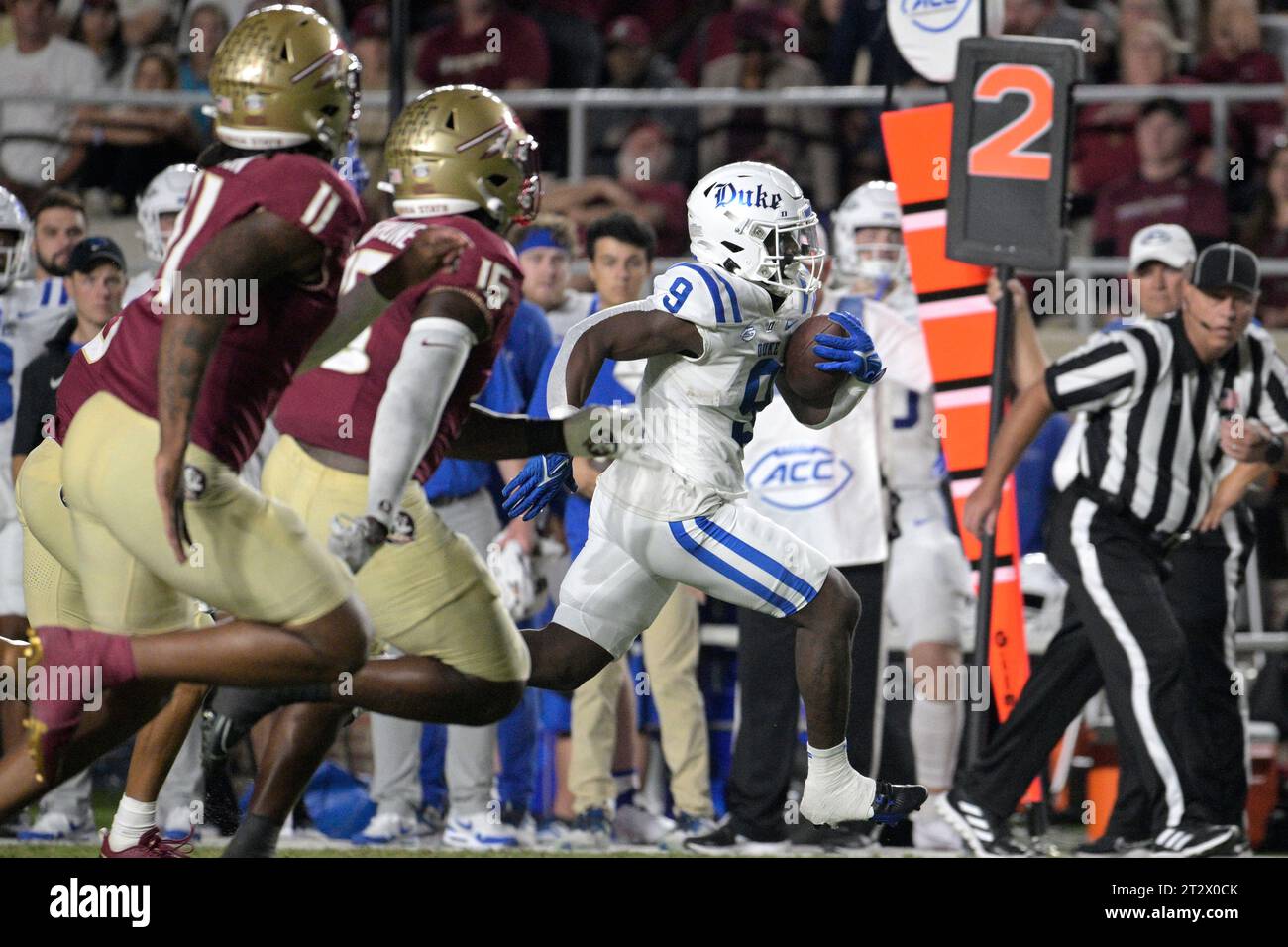 Duke running back Jaquez Moore (9) scores a touchdown run after getting ...